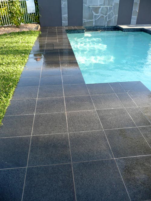 Shown closeup and wet it is Black Granite Stone Tiles tiled in place ...